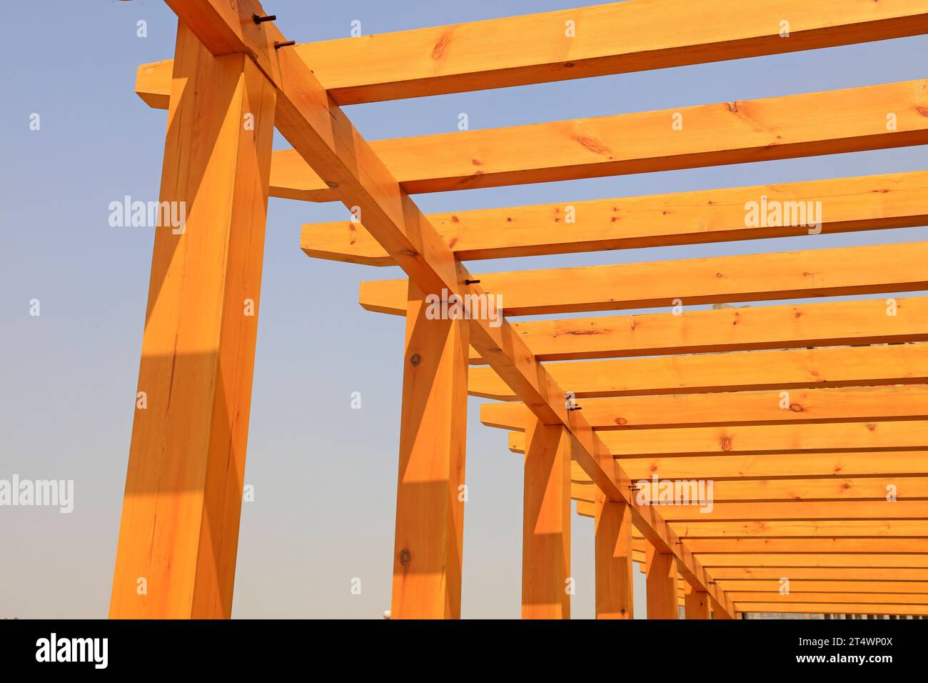 Yellow wooden railing Stock Photo - Alamy