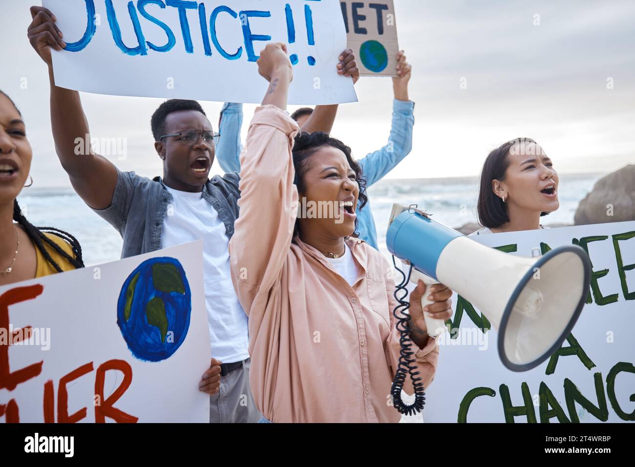 Climate change sign, megaphone and woman protest with crowd at beach ...