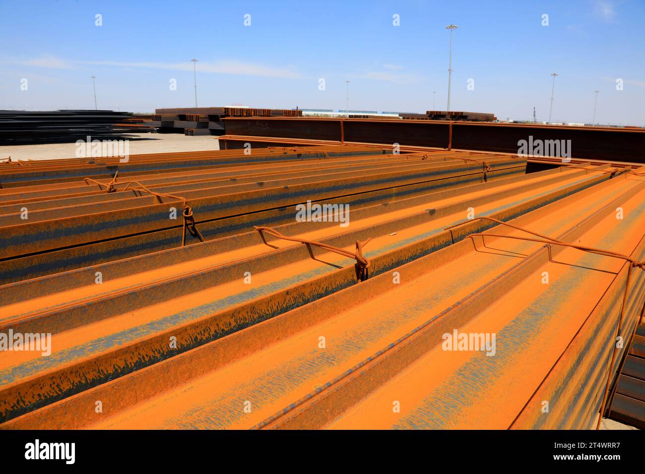 steel plate banding piled up together, closeup of photo Stock Photo - Alamy