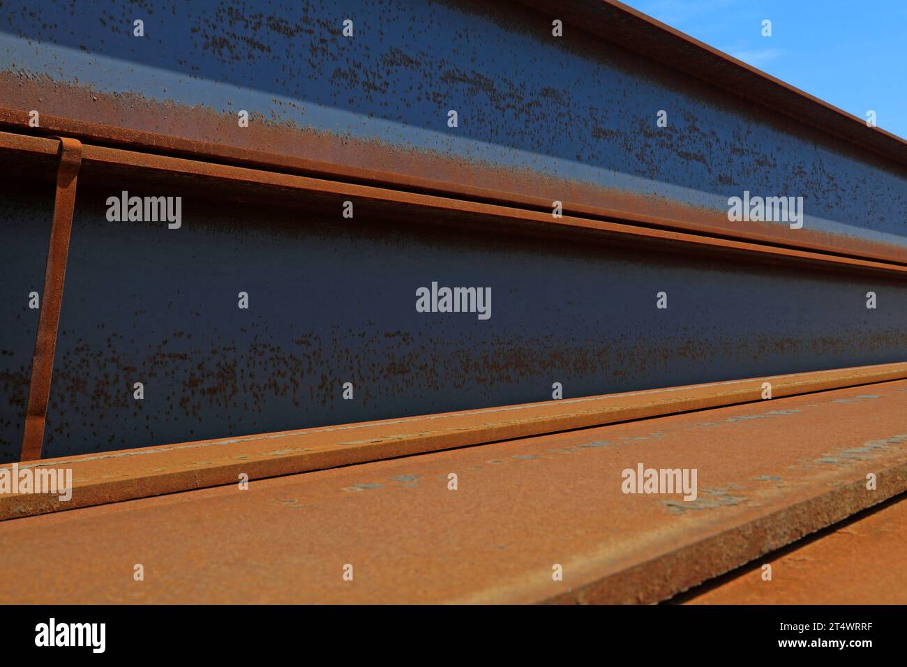 steel plate banding piled up together, closeup of photo Stock Photo - Alamy