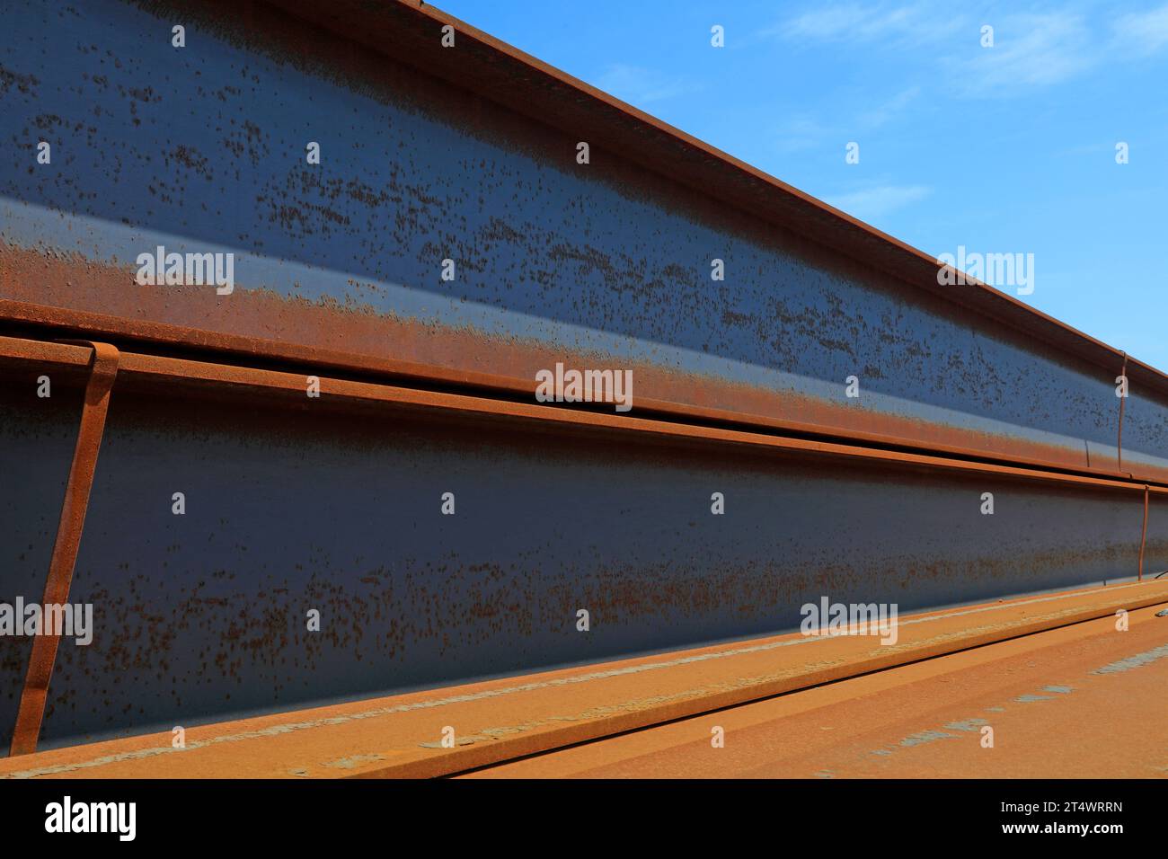 steel plate banding piled up together, closeup of photo Stock Photo - Alamy