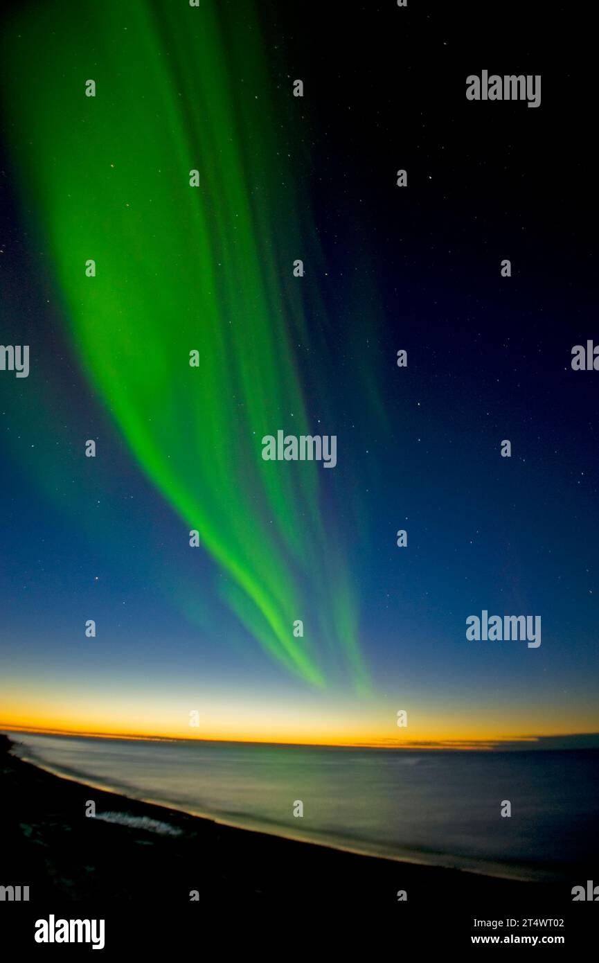 Northern lights Aurora borealis glow brightly and snake across the ...