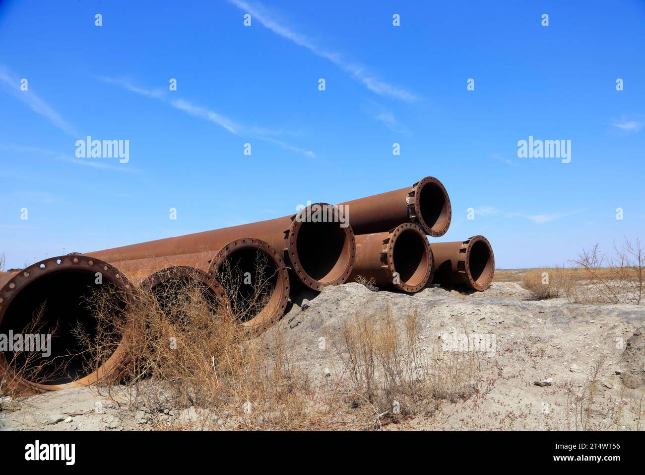 Dredging steel pipe piles in the open air Stock Photo - Alamy