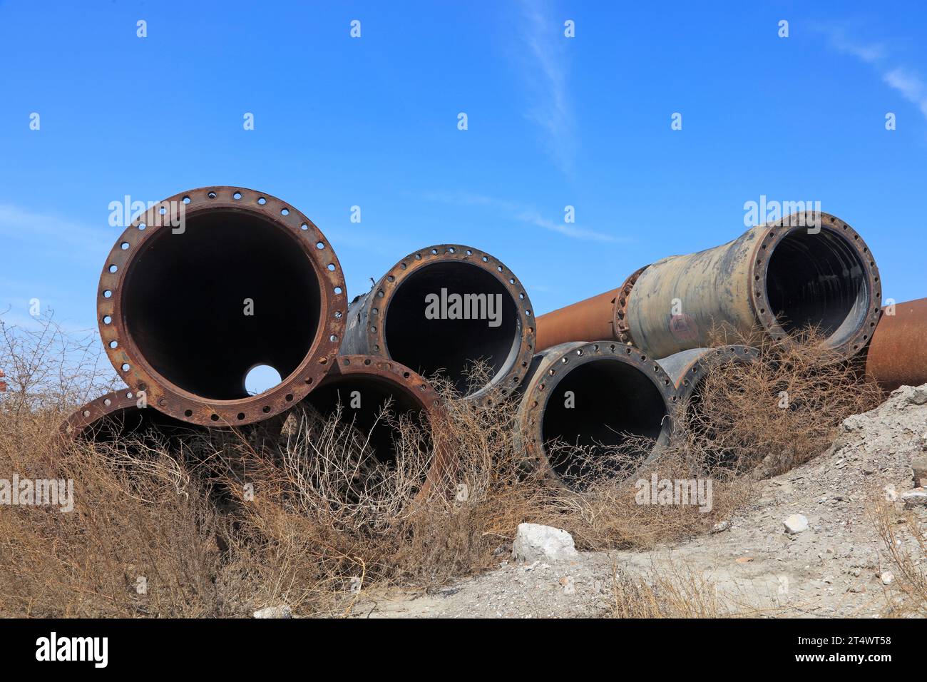 Dredging steel pipe piles in the open air Stock Photo - Alamy