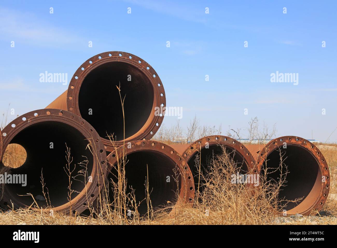 Dredging steel pipe piles in the open air Stock Photo - Alamy