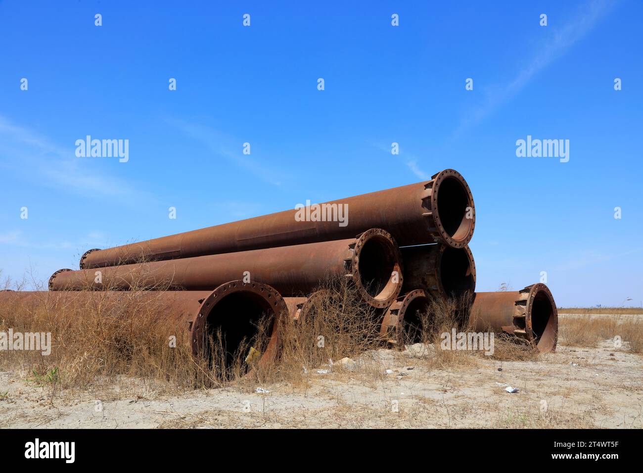 Dredging steel pipe piles in the open air Stock Photo - Alamy