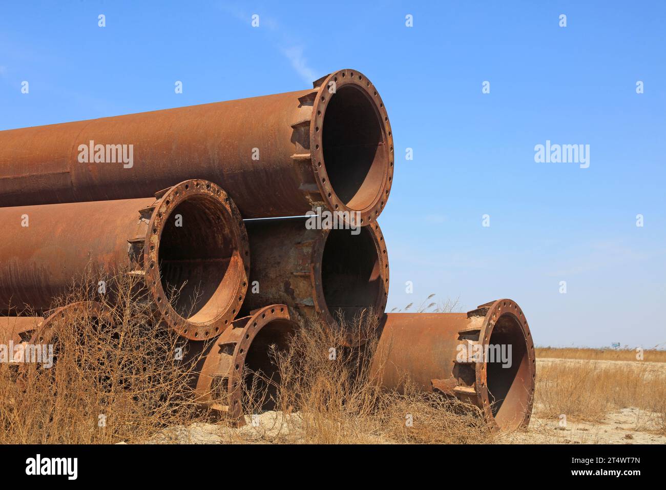 Dredging steel pipe piles in the open air Stock Photo - Alamy