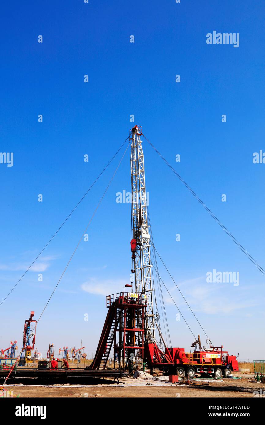 Tower type pumping unit in oil field, china Stock Photo - Alamy