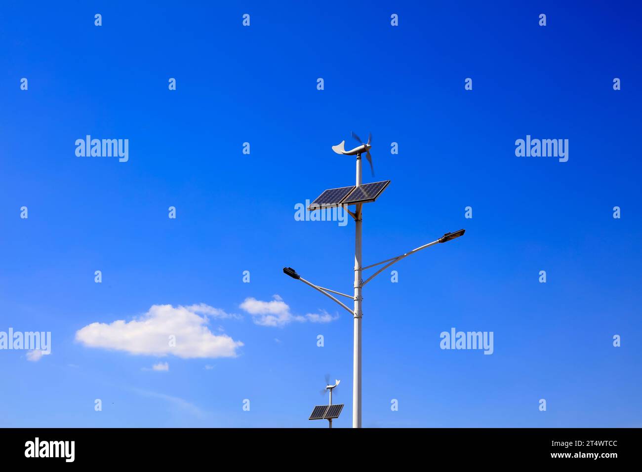 Solar wind street light under blue sky Stock Photo - Alamy