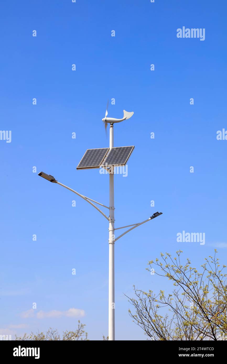 Solar wind street light under blue sky Stock Photo - Alamy