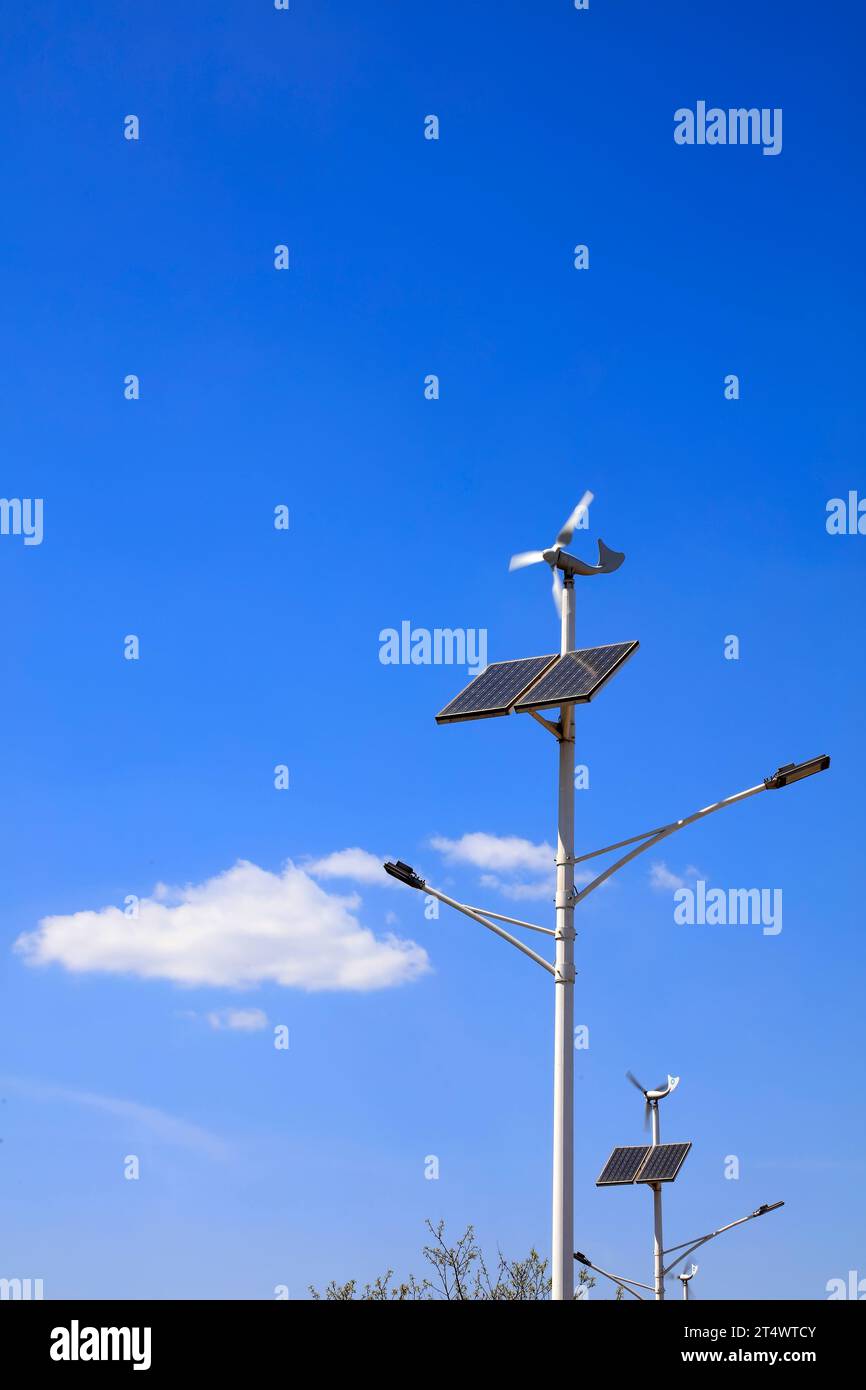 Solar wind street light under blue sky Stock Photo - Alamy