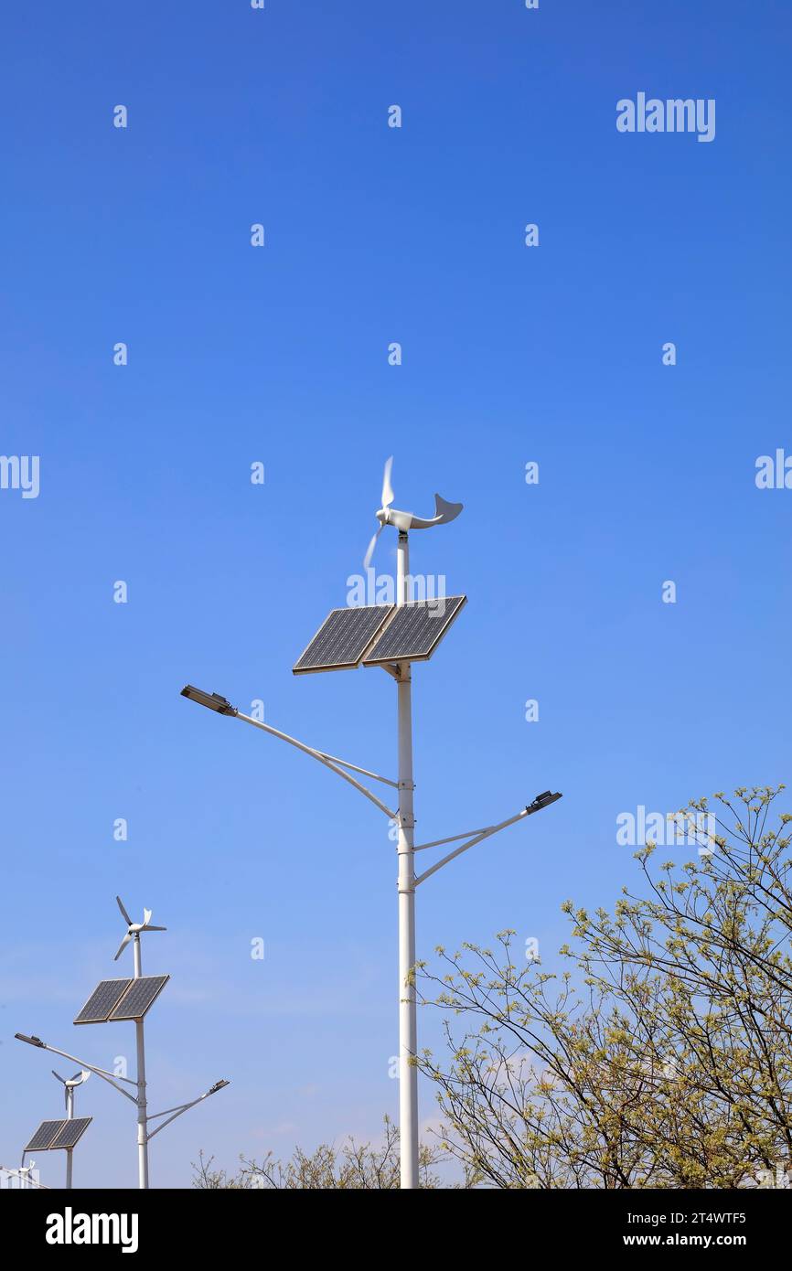 Solar wind street light under blue sky Stock Photo - Alamy
