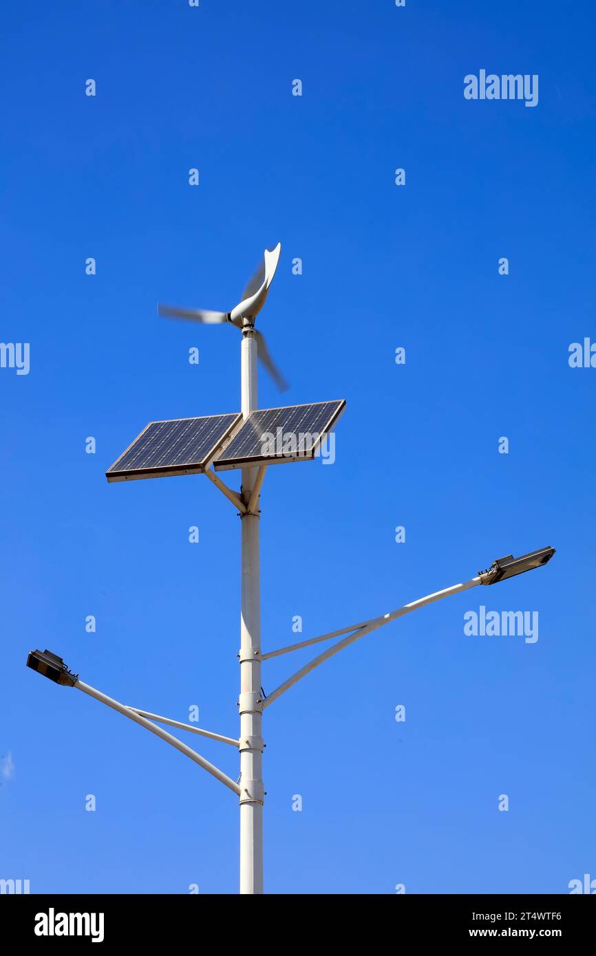 Solar wind street light under blue sky Stock Photo - Alamy