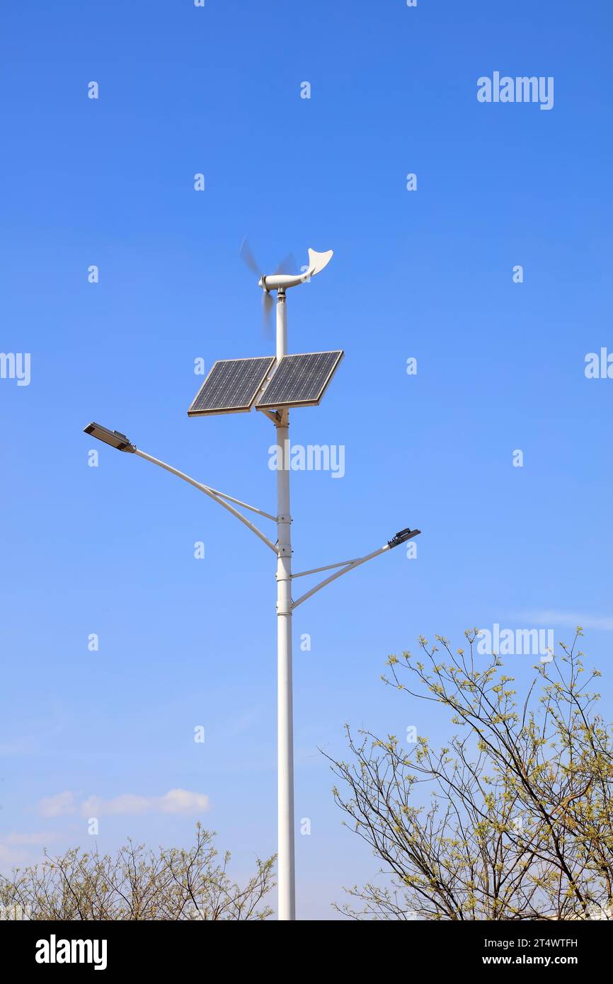 Solar wind street light under blue sky Stock Photo - Alamy