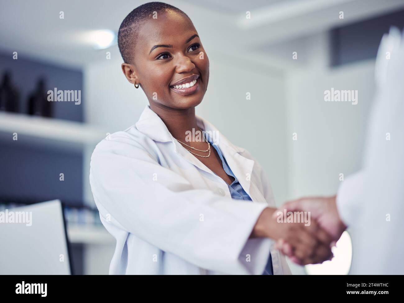 Black woman, scientist and handshake, smile for partnership and science ...