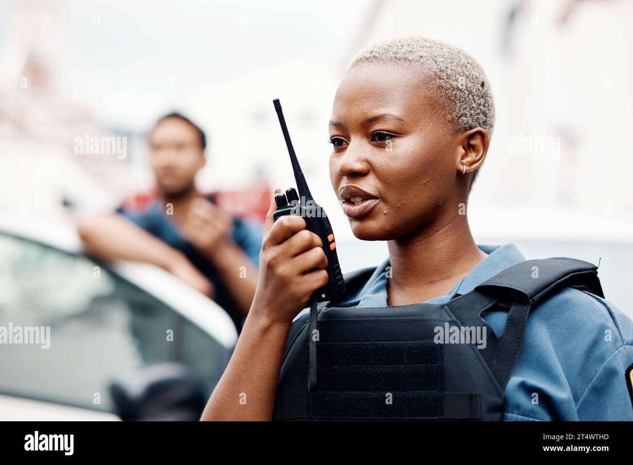 Black woman, police and walkie talkie for radio in city communication ...