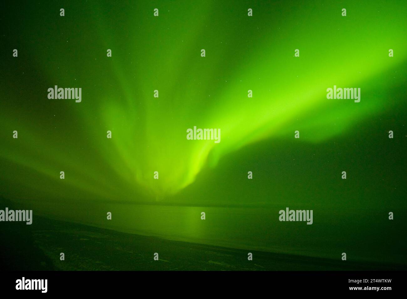 Northern lights Aurora borealis glow brightly and snake across the ...