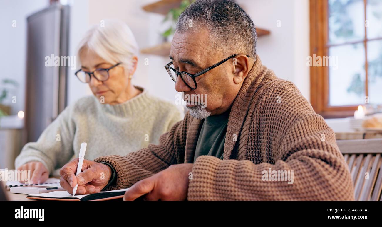 Elderly man signing papers hi-res stock photography and images - Alamy