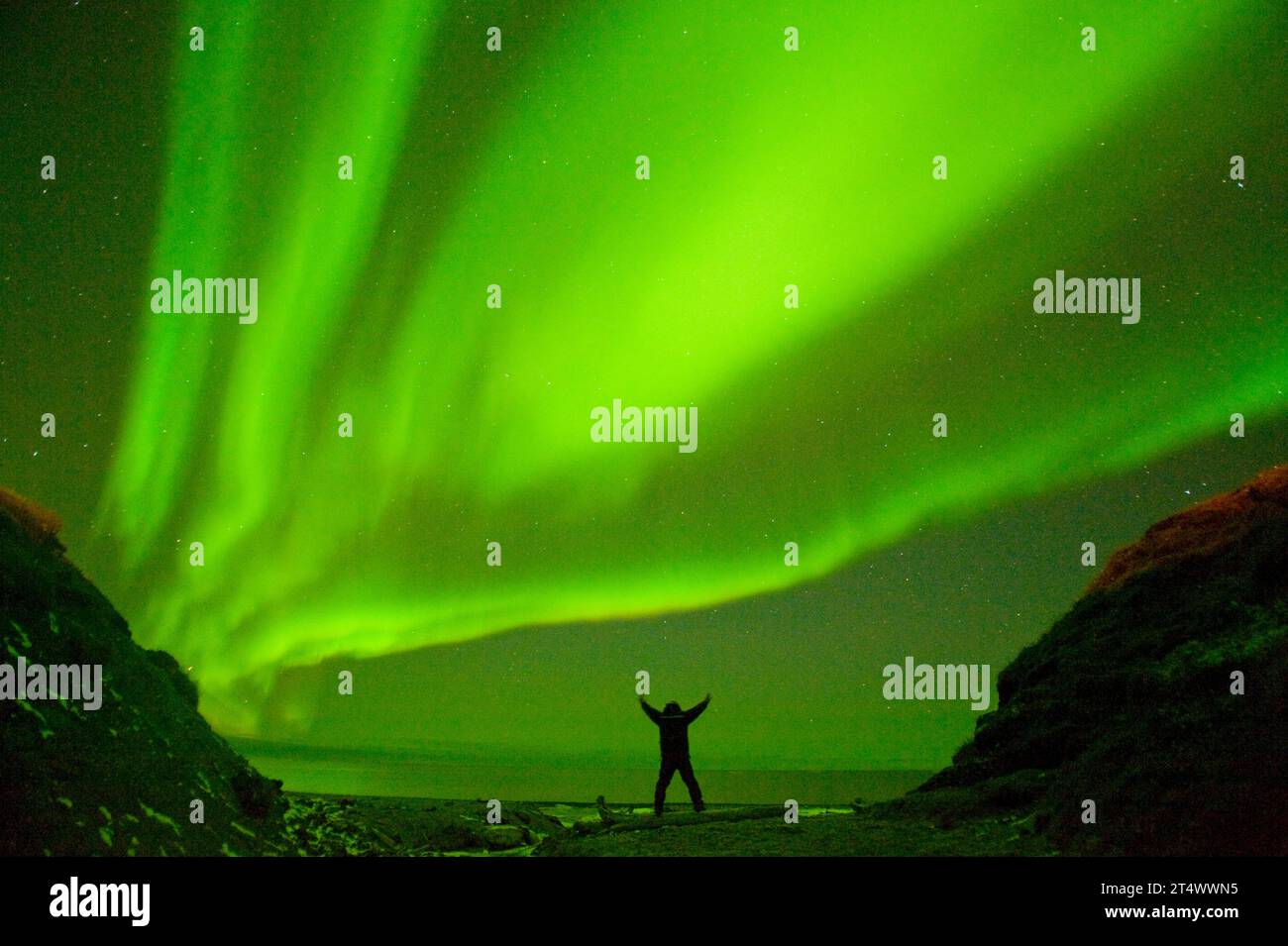 Northern lights Aurora borealis glow brightly and snake across the ...