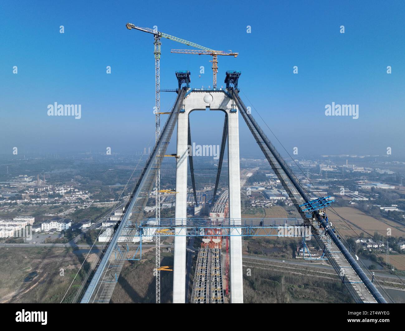 Aerial photo shows the Longtan Yangtze River Bridge under construction ...