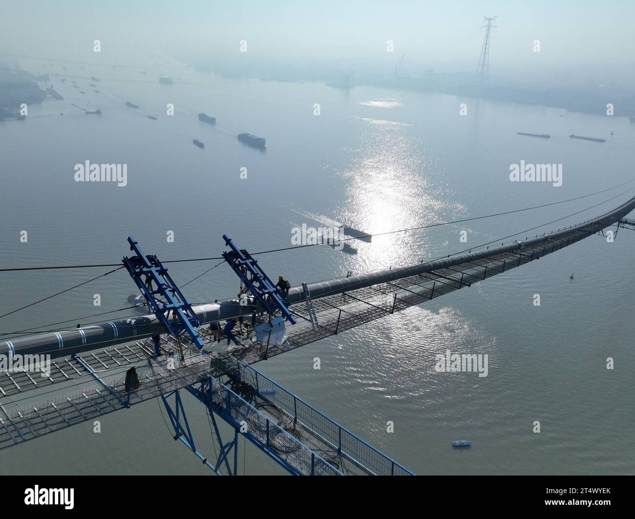 Aerial photo shows the Longtan Yangtze River Bridge under construction ...