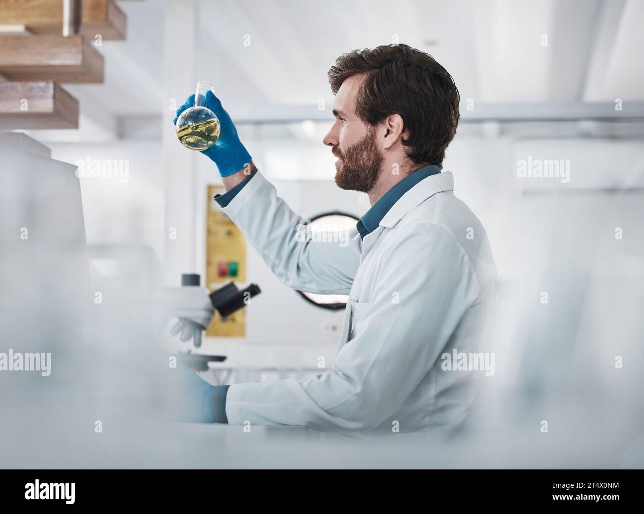 Science, man and laboratory with chemical liquid for chemistry research ...