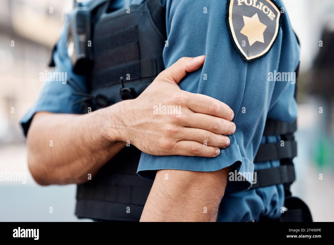 Man, police and arm injury in city from accident, gun shot or pain in ...