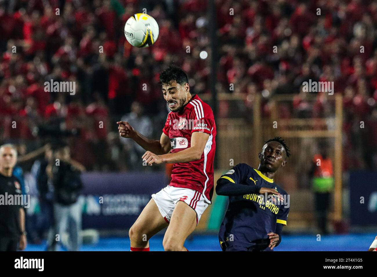 Cairo, Egypt. 1st Nov, 2023. Akram Tawfik (top) of Al Ahly competes ...
