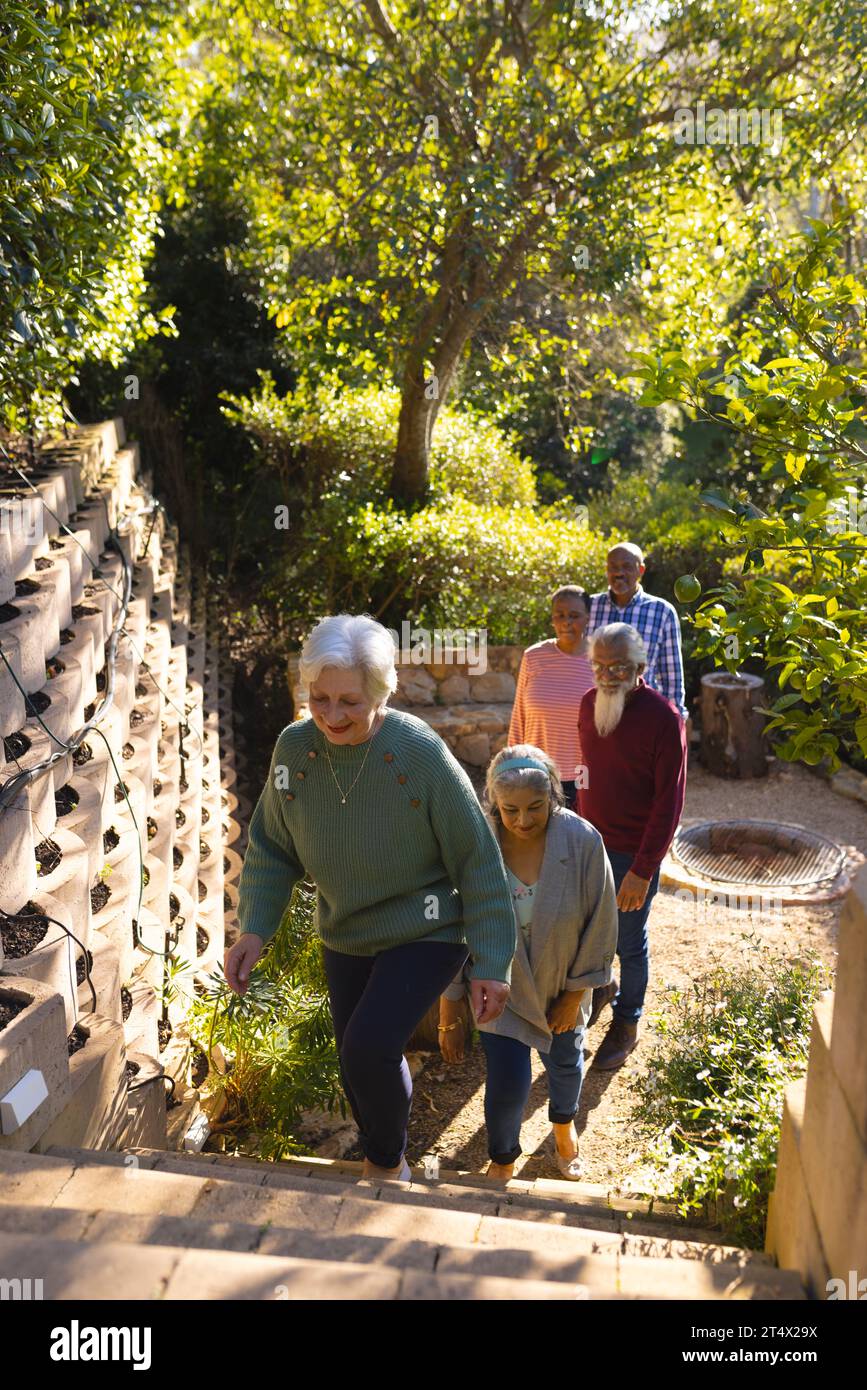 Diverse group walking hi-res stock photography and images - Alamy