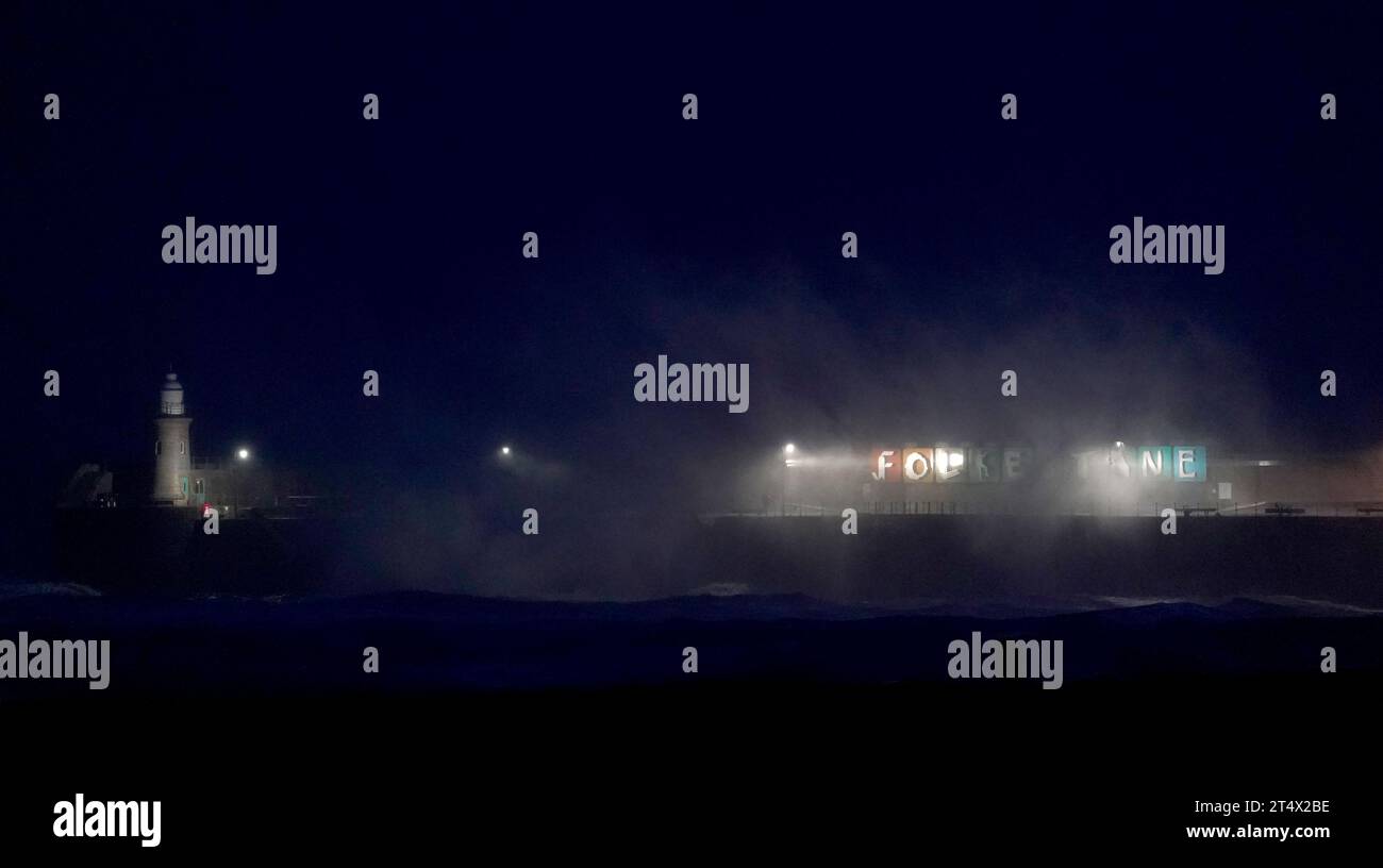 Waves crash over the harbour arm in Folkestone, Kent, as Storm Ciaran ...