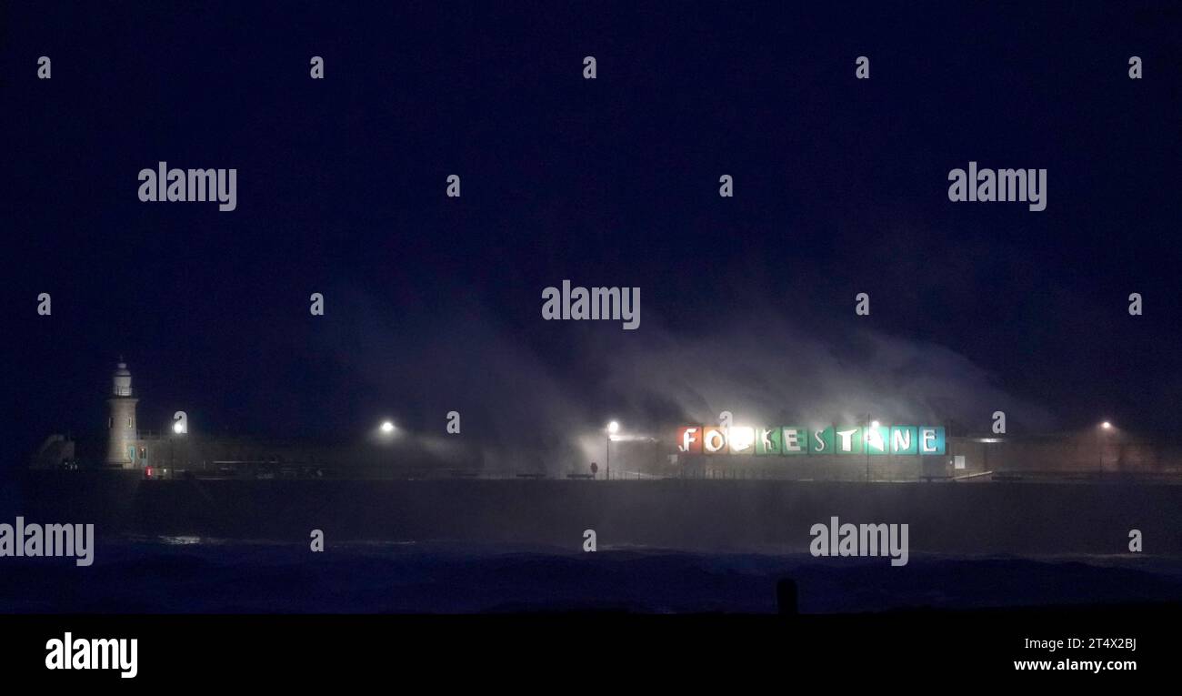 Waves crash over the harbour arm in Folkestone, Kent, as Storm Ciaran ...
