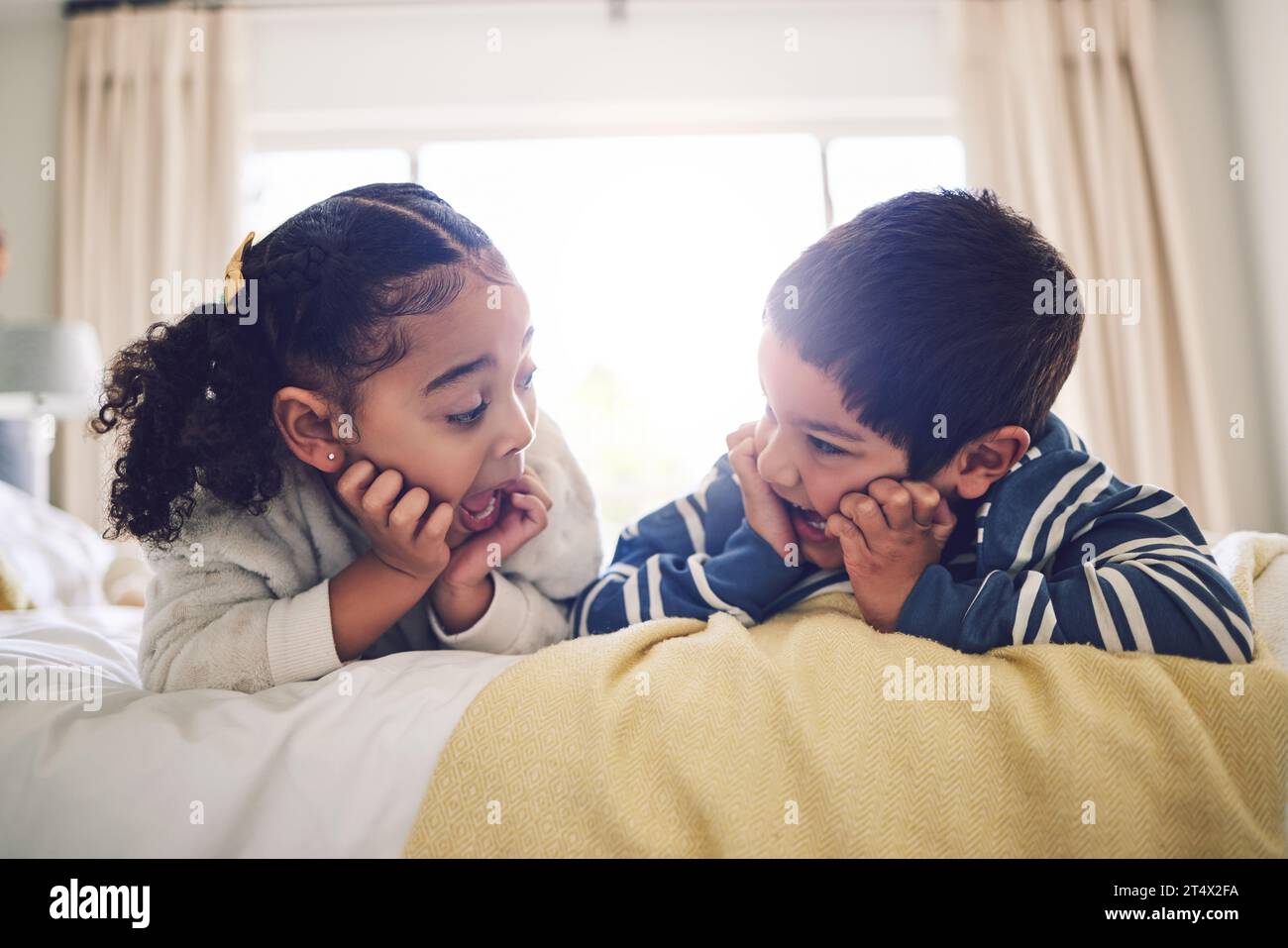 Brother sister talking bedroom hi-res stock photography and images - Alamy