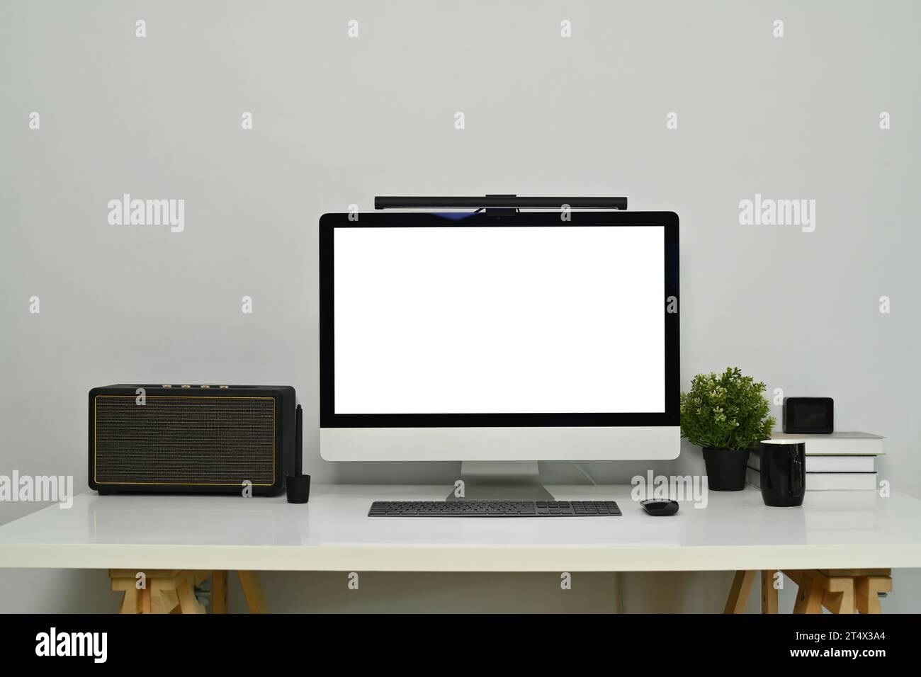 Modern workplace with bank screen of desktop computer on desk. White ...