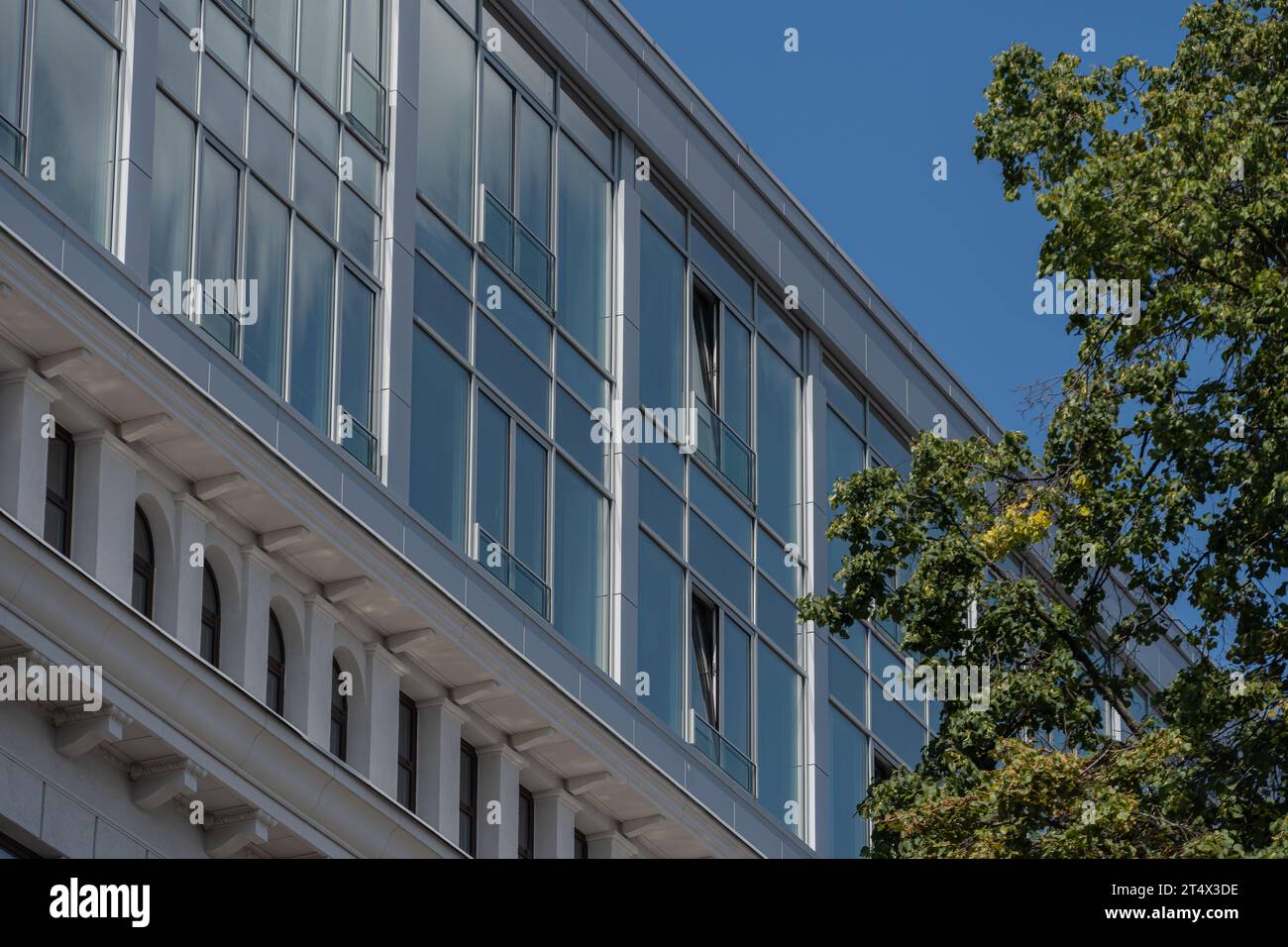 New building facade in housing complex. Modern style in architecture ...