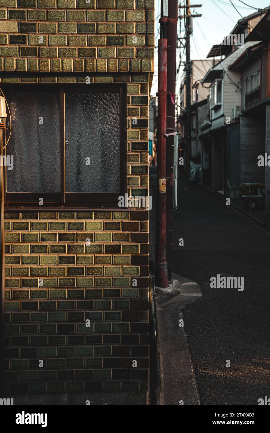 An angled view of a three-window brick wall, showcasing its unique ...