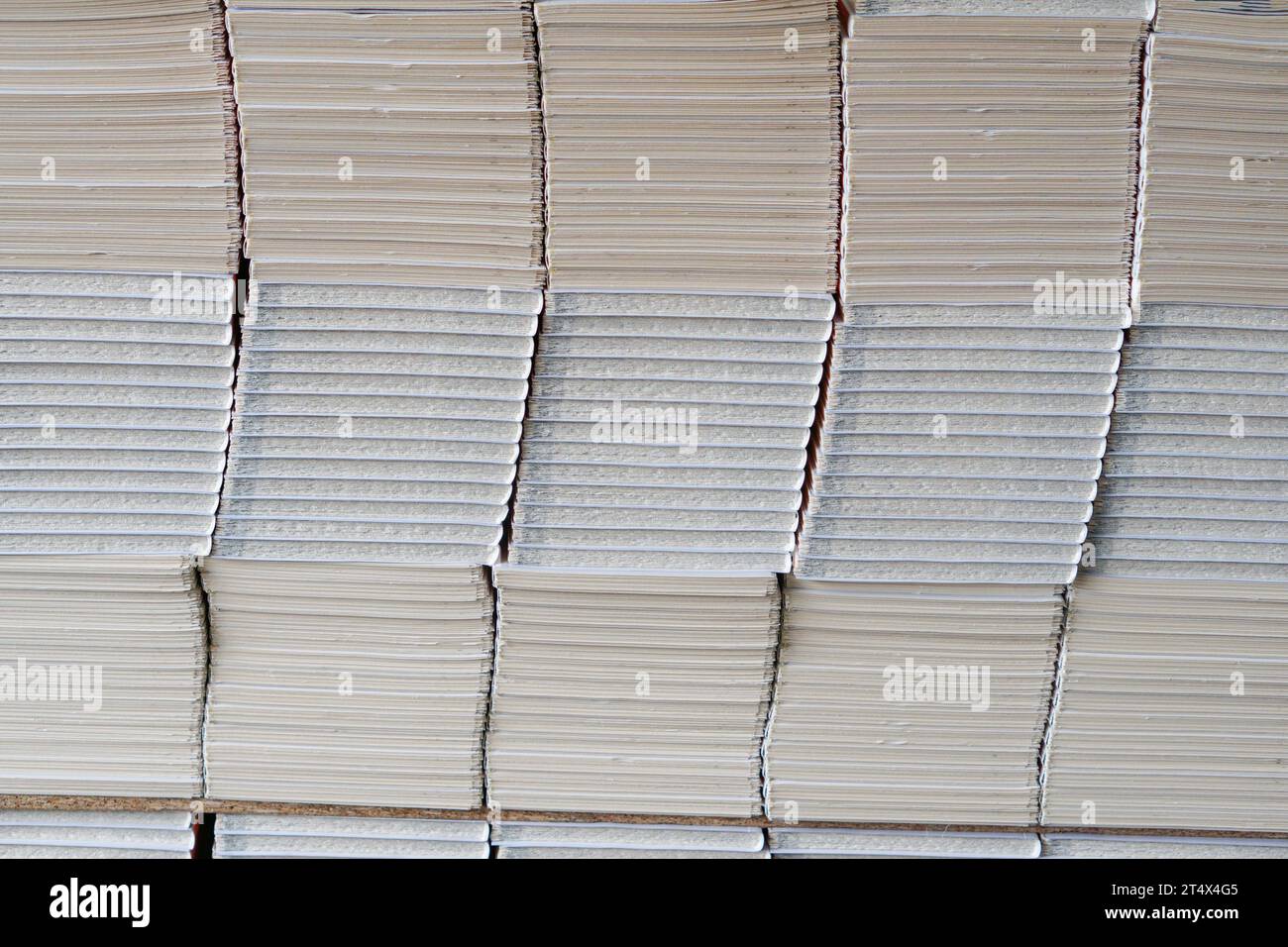 Stacks of books after going through printing production in the offset ...