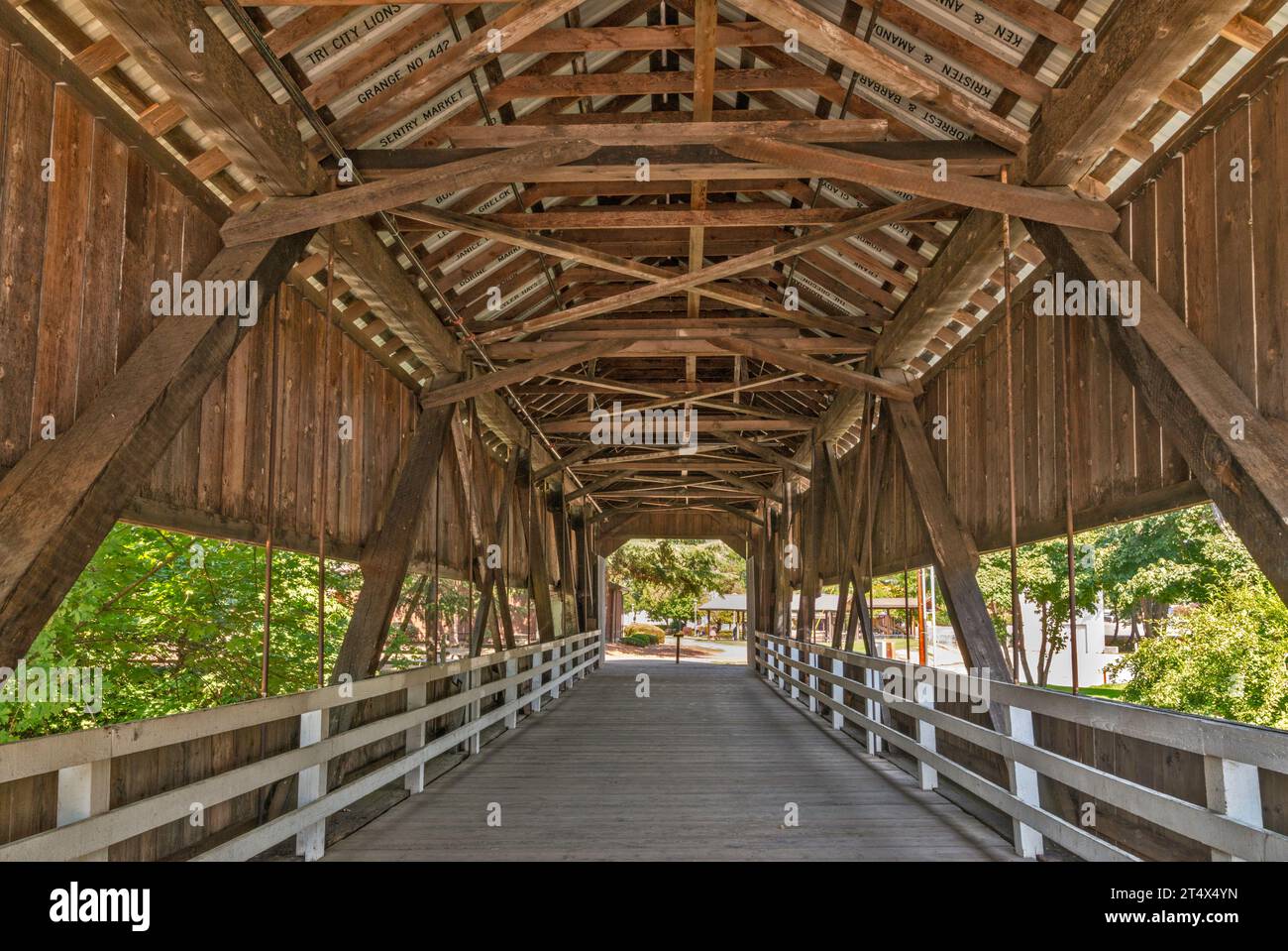 Wood beams, roof at Grave Creek Bridge, a covered Howe truss bridge in ...