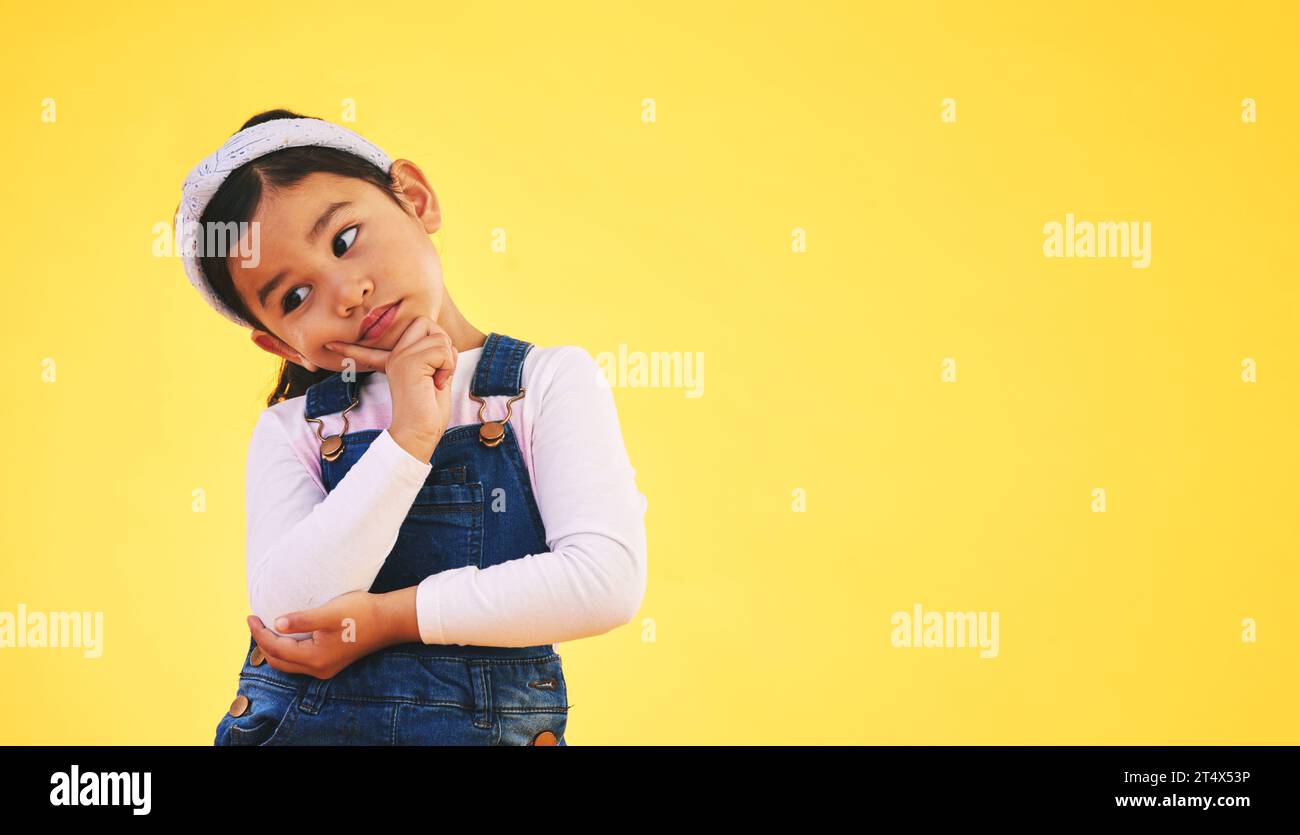 Confused, thinking and kid in doubt, decision and studio isolated on ...