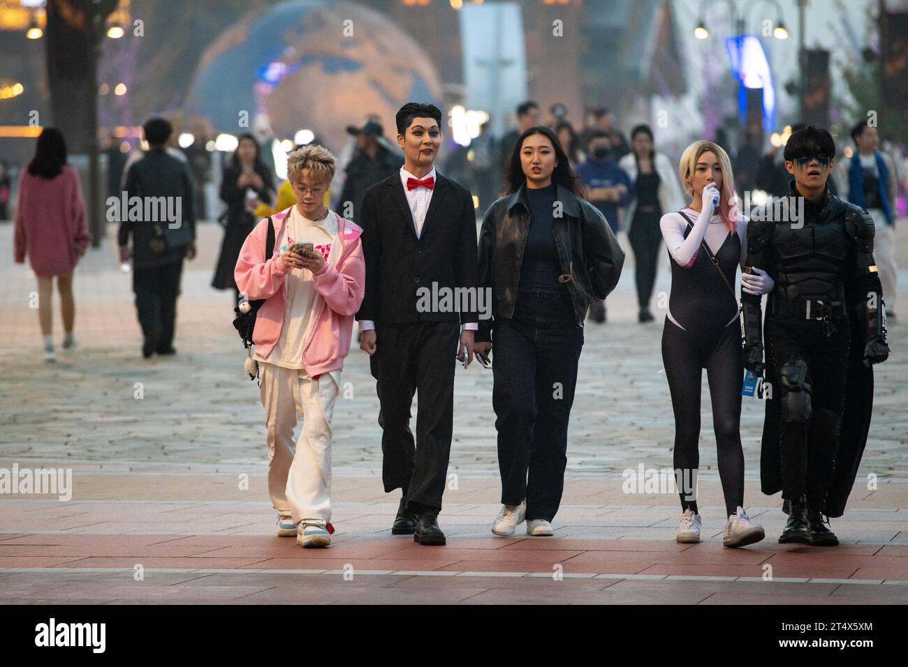 Tourists dress up in various Halloween themed costumes at Universal ...