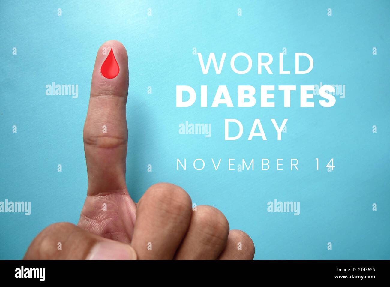 World diabetes day awareness concept. Blue ribbon with blood drops on a ...