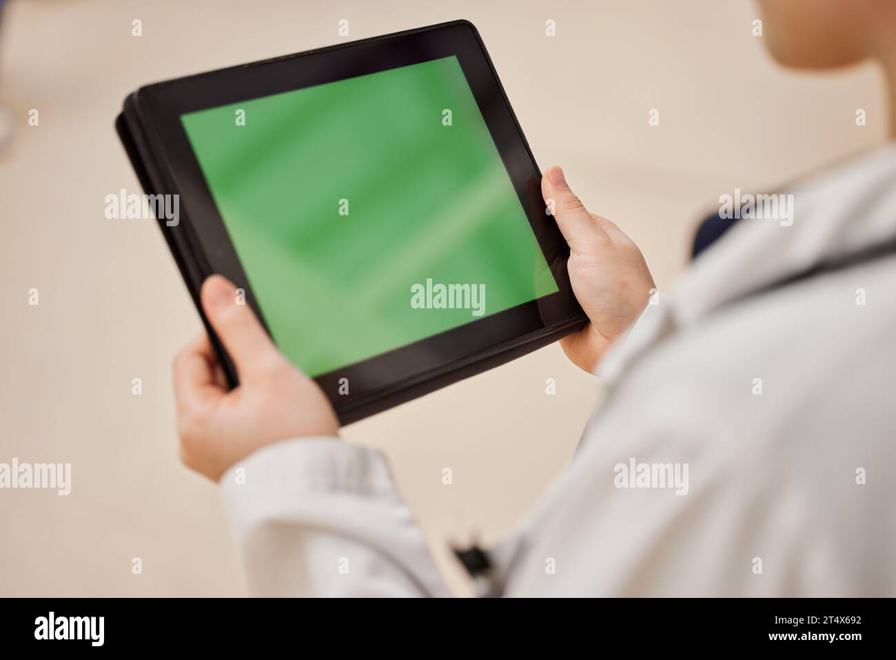 Hands, healthcare and green screen on a tablet with a doctor in the ...