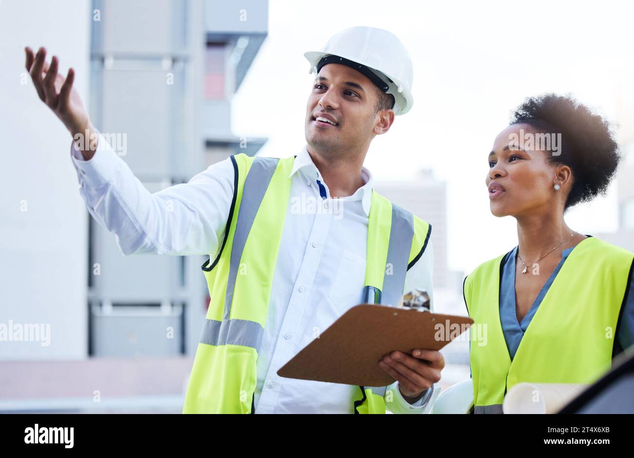 Planning, clipboard and team of construction workers working in ...