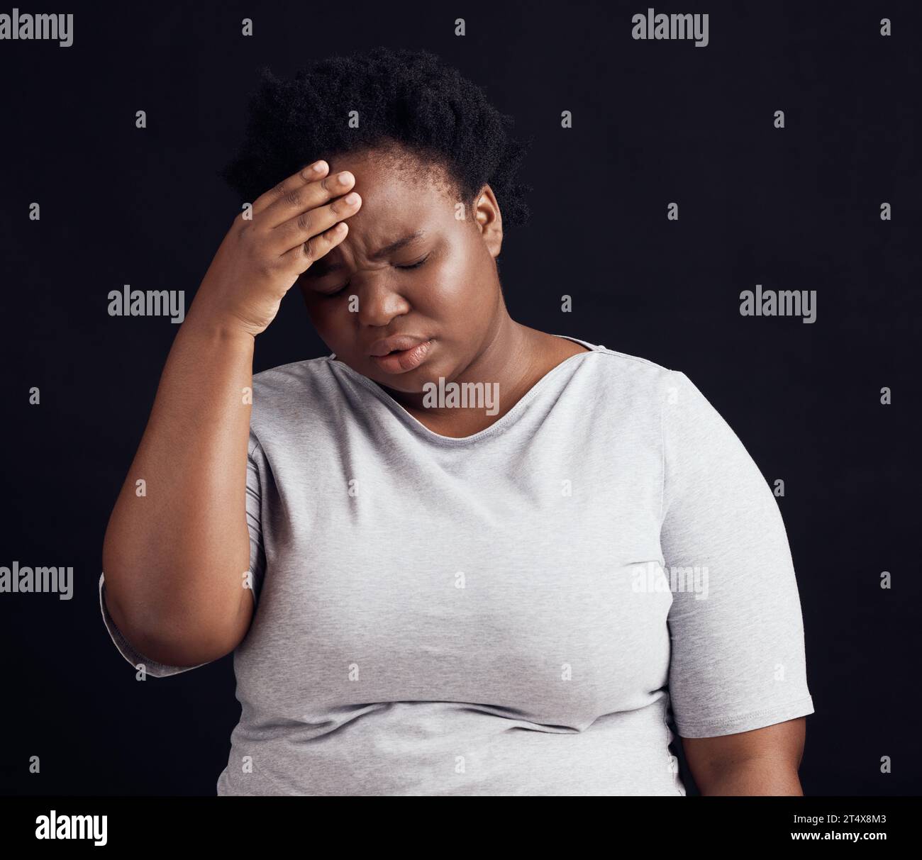 Sad black woman, headache and stress in studio of anxiety, trauma risk ...