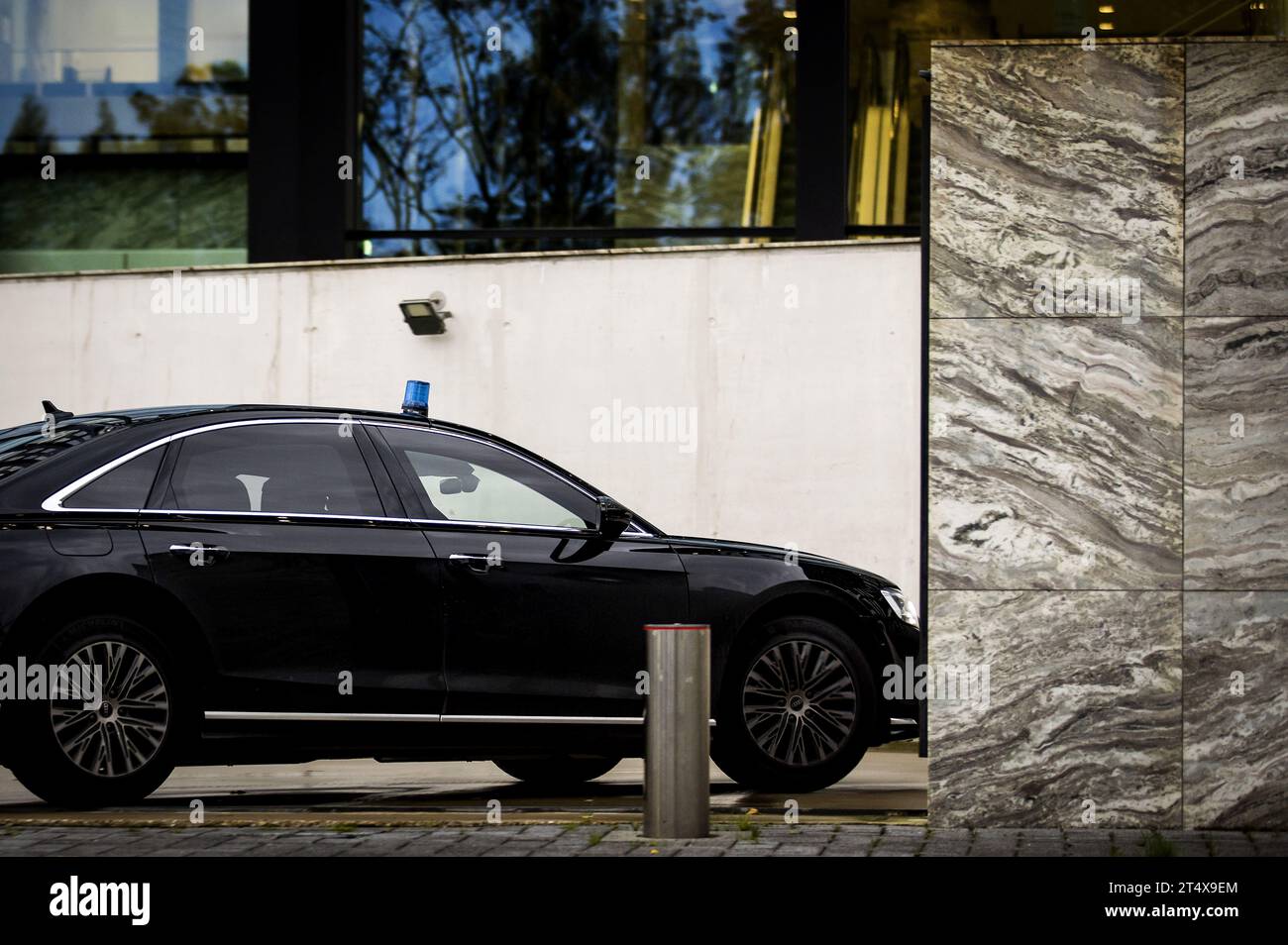 AMSTERDAM - A secured car arrives at the Amsterdam District Court. The ...