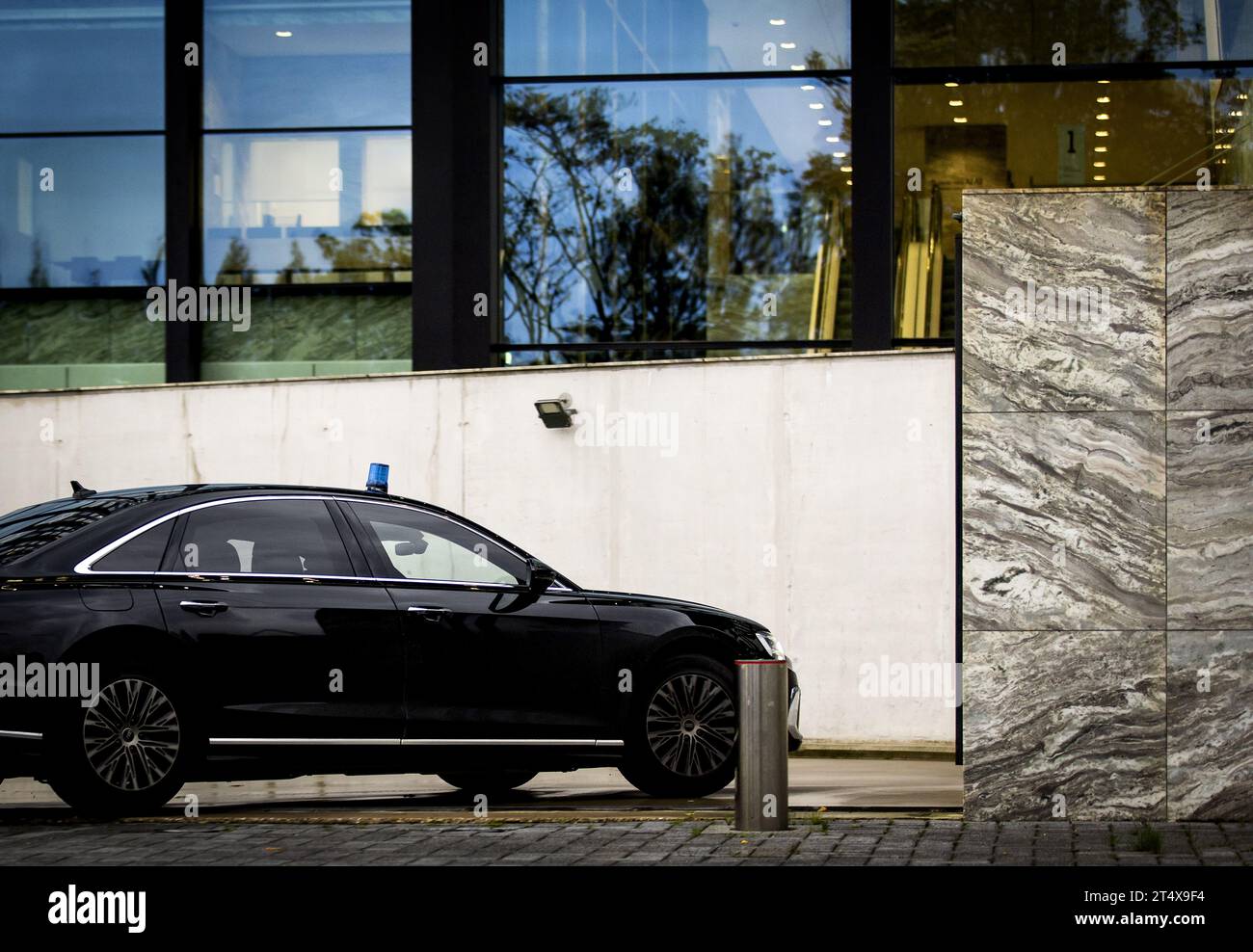 AMSTERDAM - A secured car arrives at the Amsterdam District Court. The ...