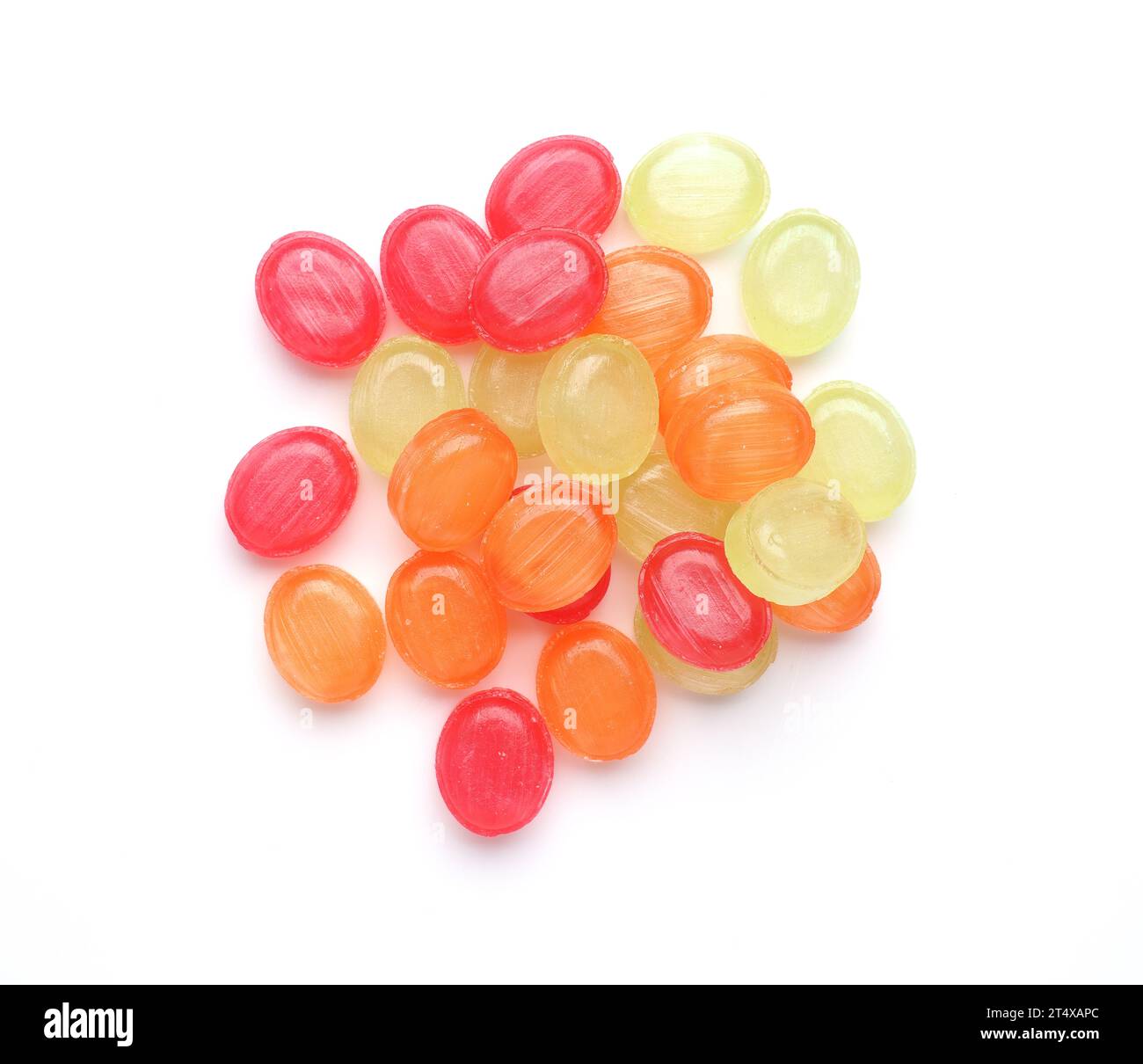 Heap of colorful candies on a white background, unhealthy food or ...