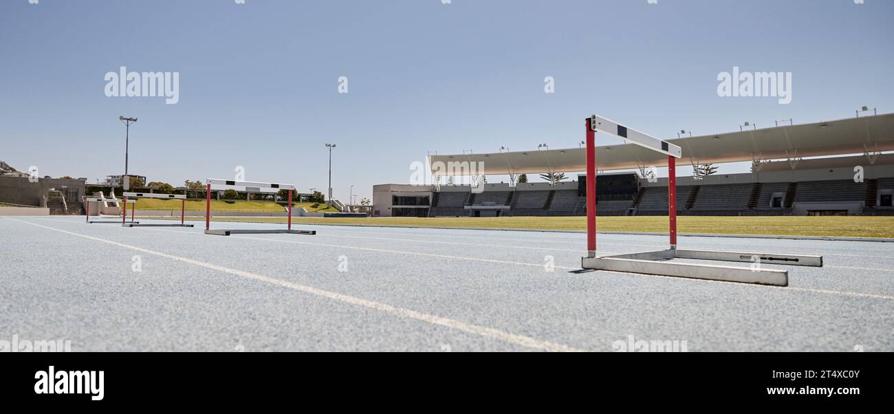 Stadium, hurdles and sports event for exercise, olympics and training ...