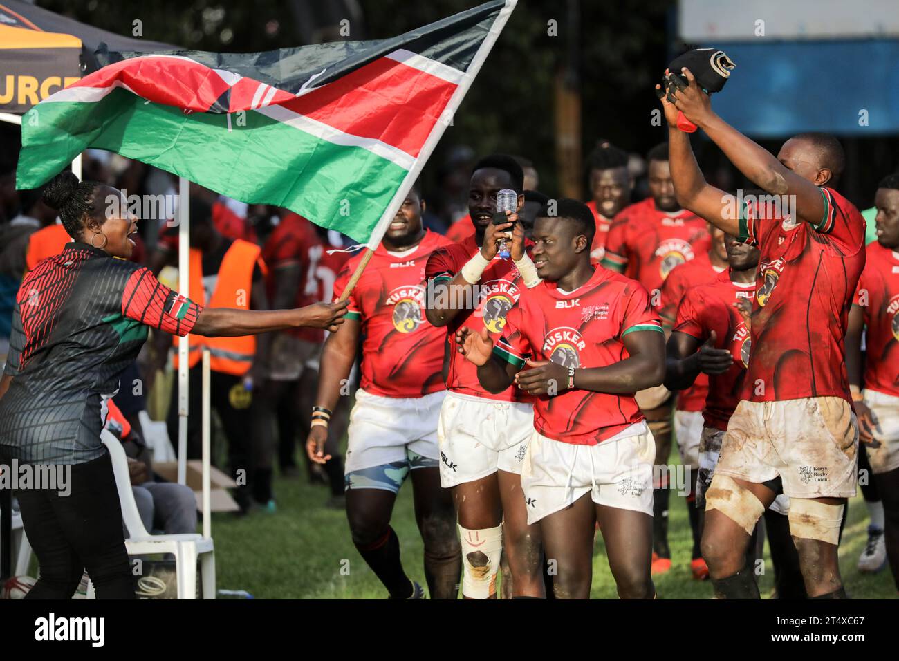 Kampala, Uganda. 1st Nov, 2023. A fan gives a Kenyan flag to Kenyan ...