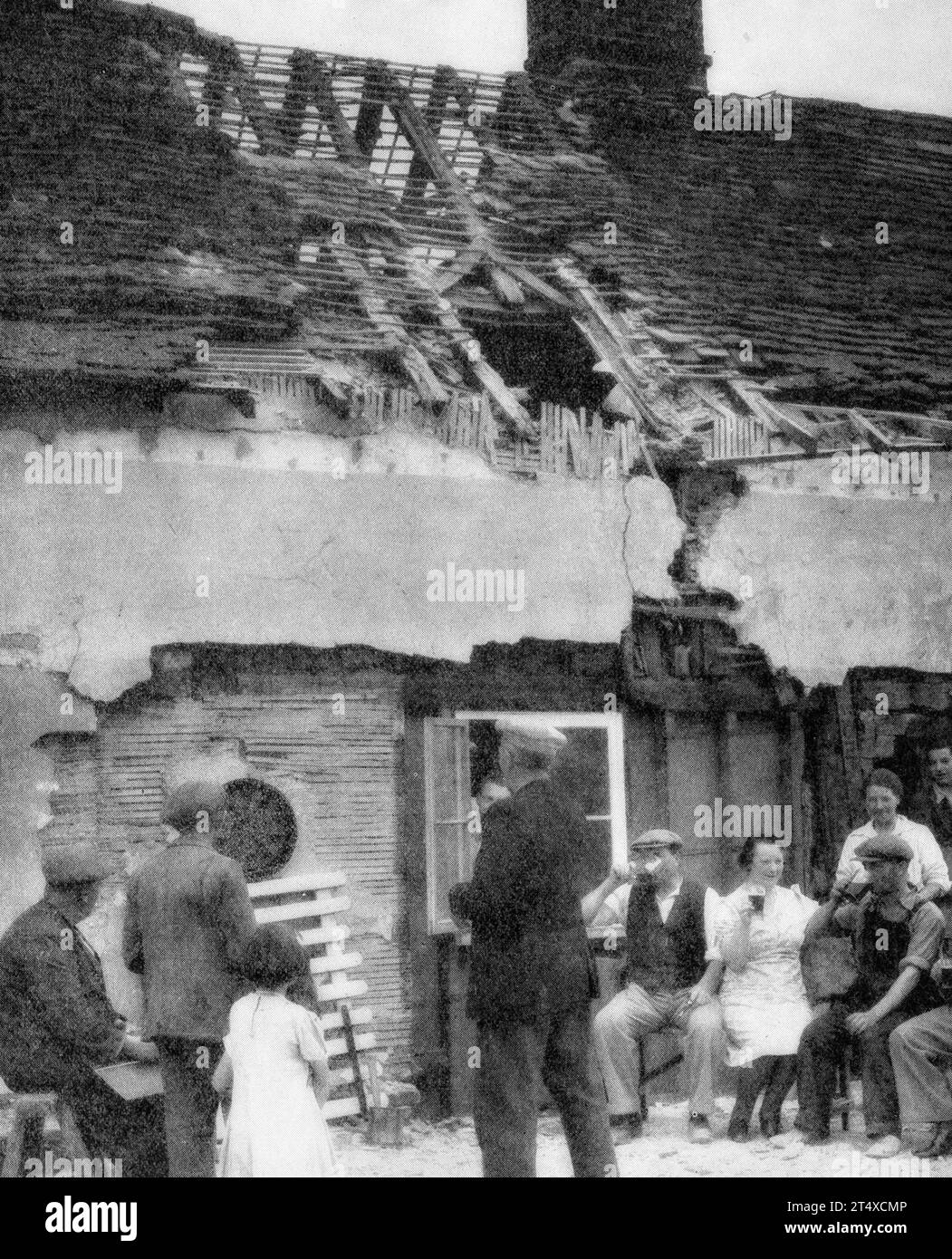 Following the destruction from a high explosive bomb on a pub in the ...