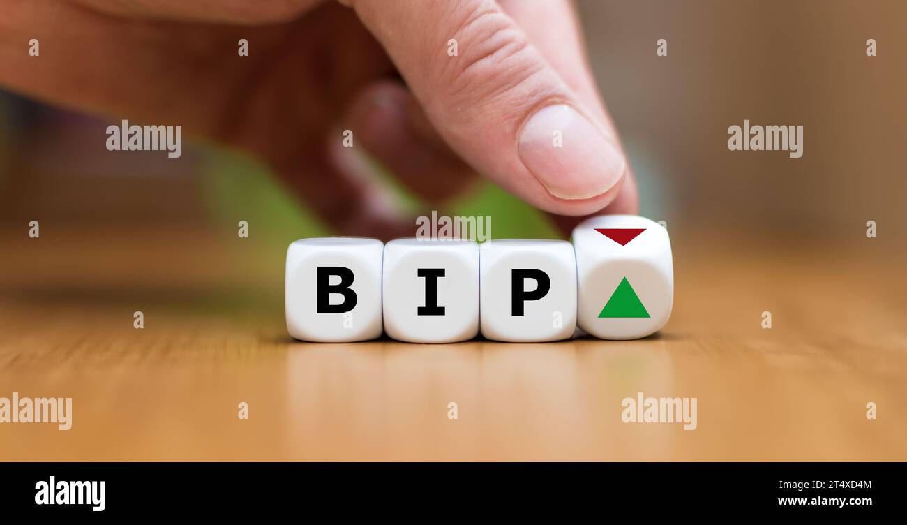 Hand changes the orientation of an arrow next to the abbreviation BIP ...